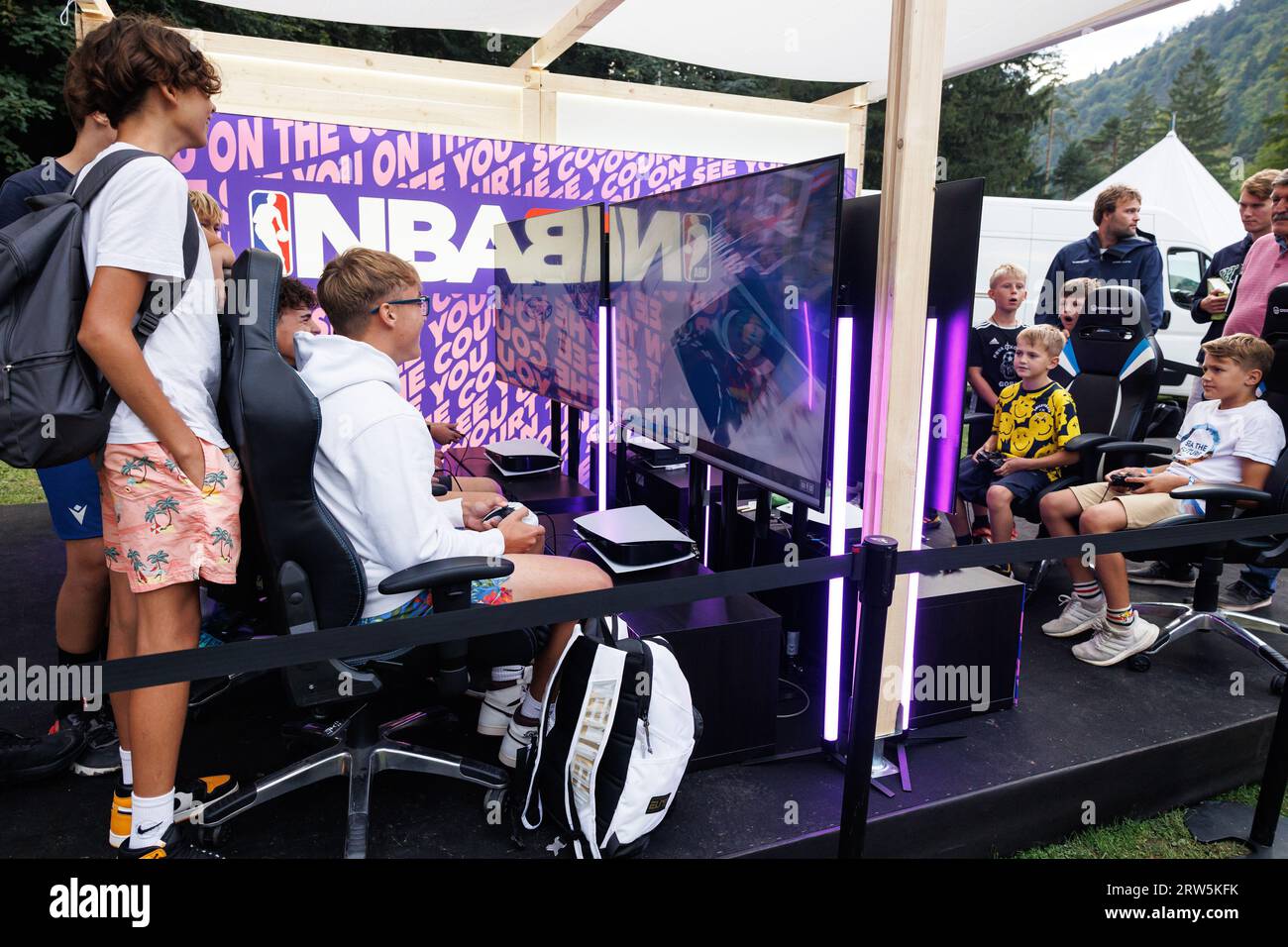 Bled, Slovenia. 16th Sep, 2023. Children play basketball video games ...