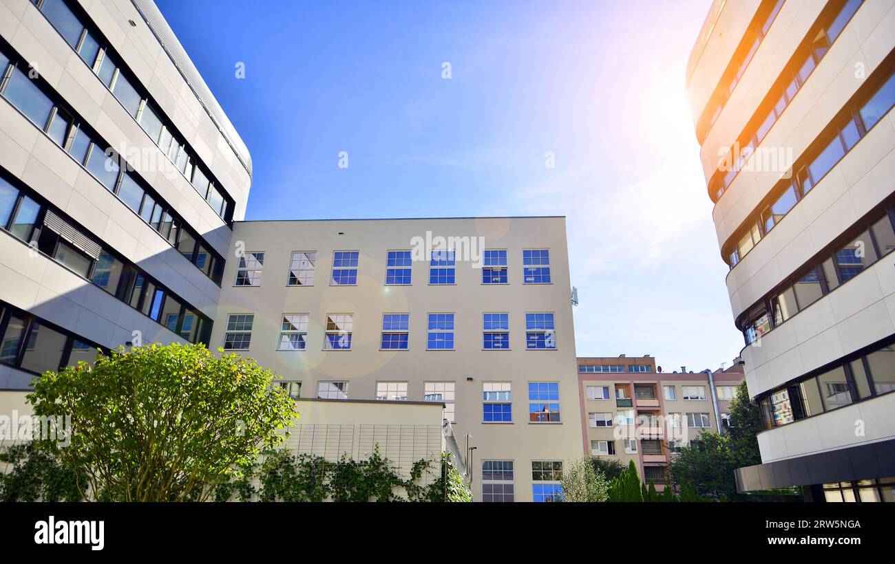 The exterior wall of a contemporary commercial-style building with ...