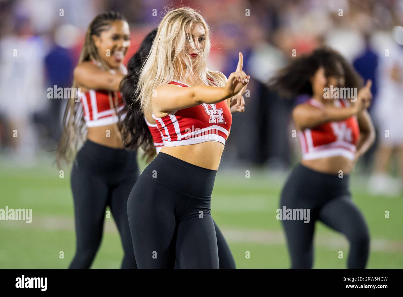 Houston, TX, USA. 16th Sep, 2023. The Cougar Dolls Dance Team performs ...
