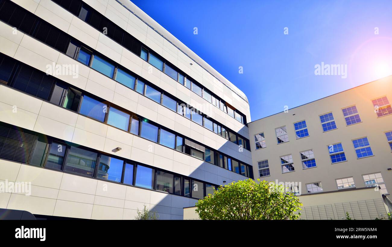 The exterior wall of a contemporary commercial-style building with ...