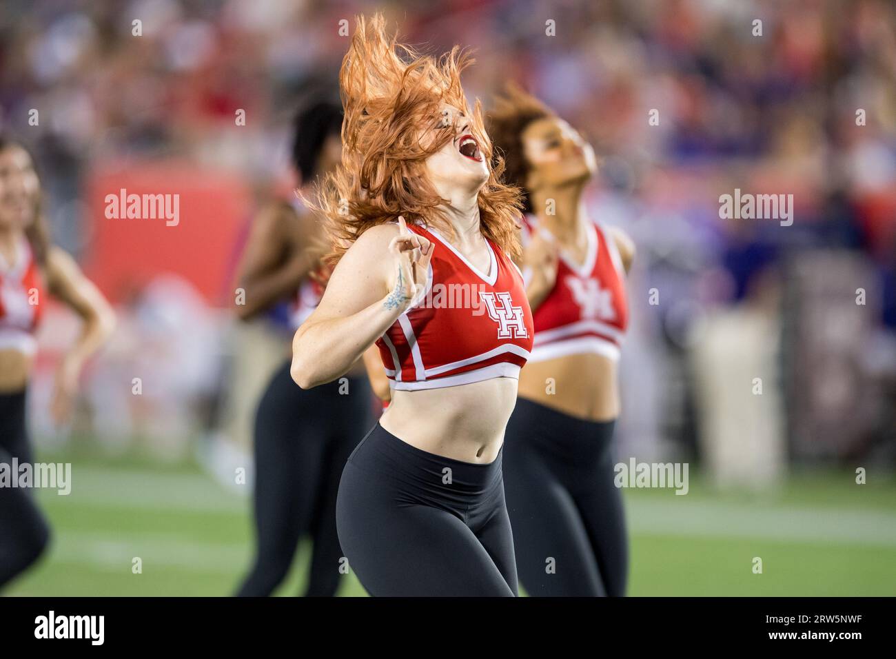 Houston, TX, USA. 16th Sep, 2023. The Cougar Dolls Dance Team performs ...