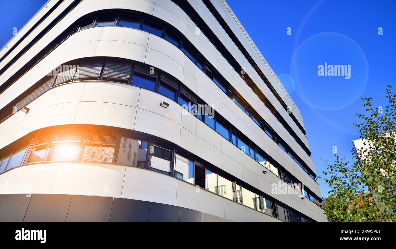The exterior wall of a contemporary commercial-style building with ...