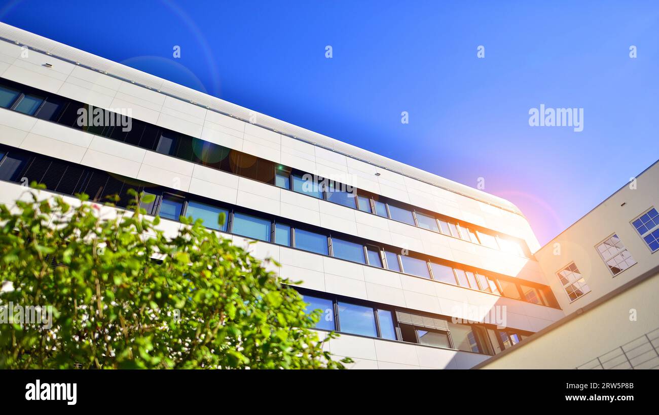 The exterior wall of a contemporary commercial-style building with ...