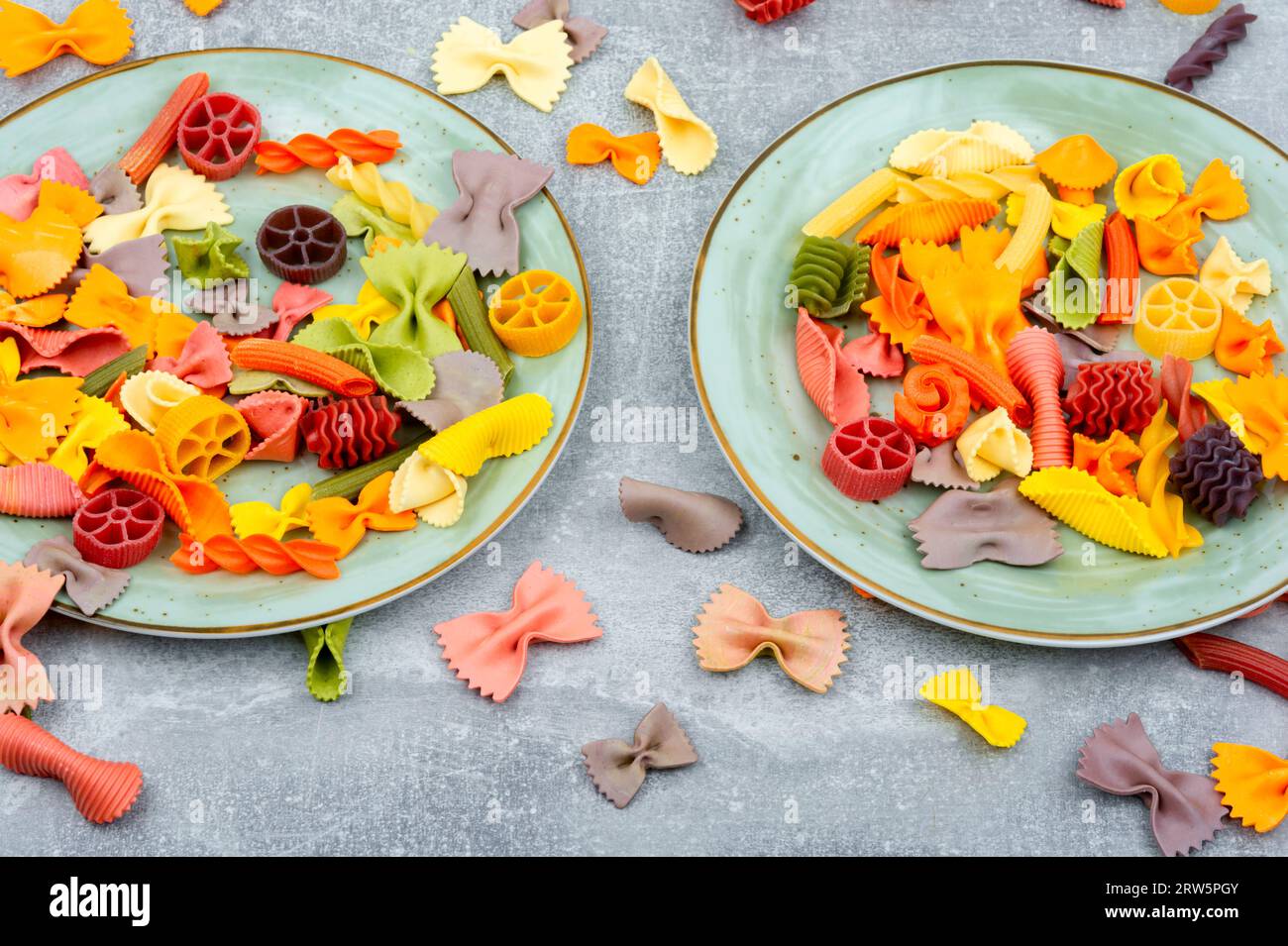Colored dry pasta or macaroni for kids Stock Photo - Alamy