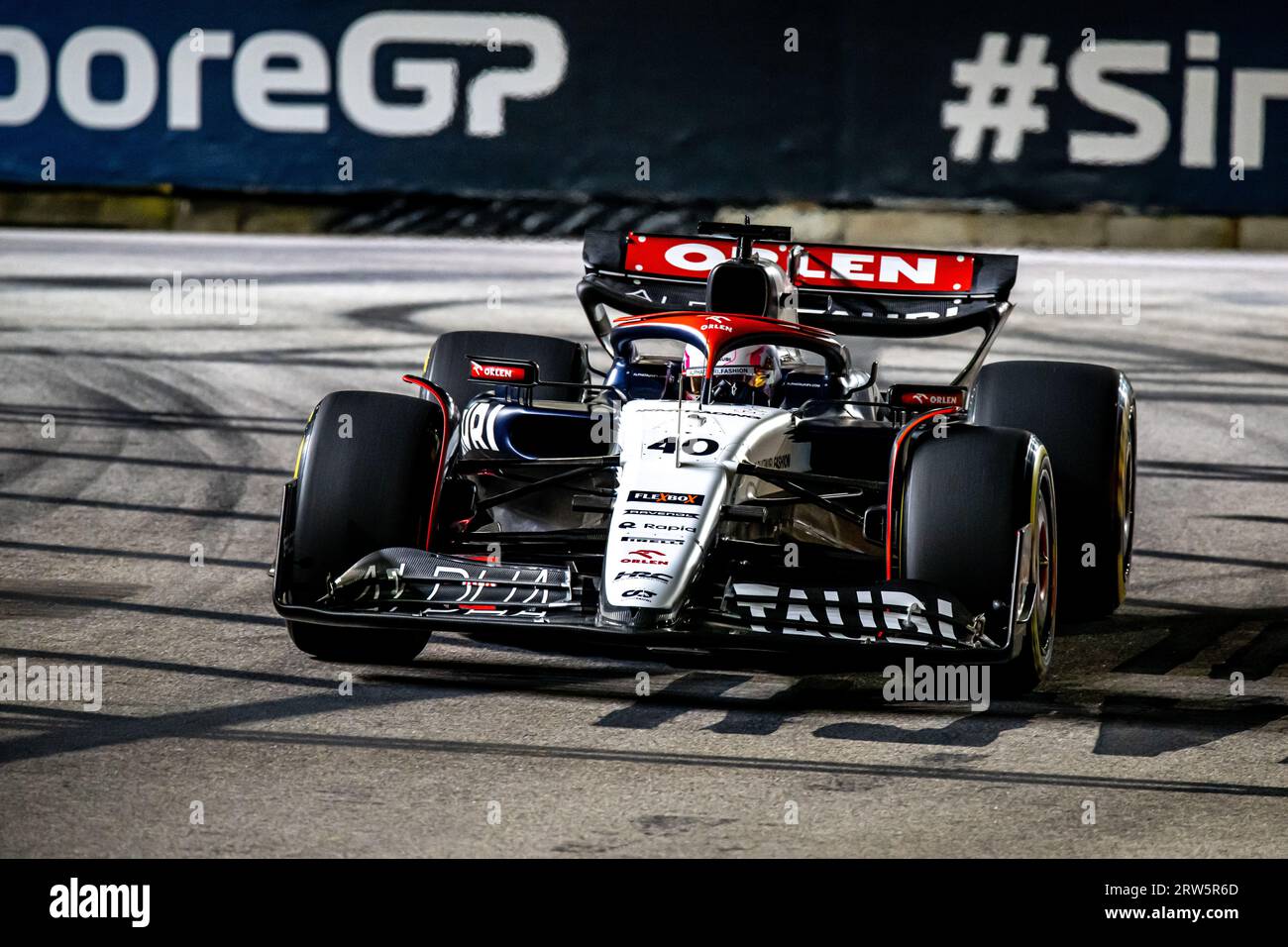 MARINA BAY STREET CIRCUIT, SINGAPORE - SEPTEMBER 15: Liam Lawson ...