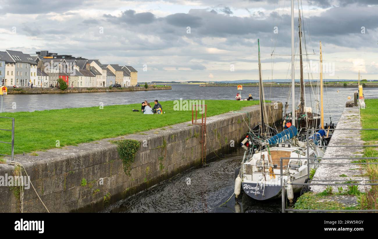 boat anchored in Eglinton Canal Sea Lock, The Long Walk, Galway ...