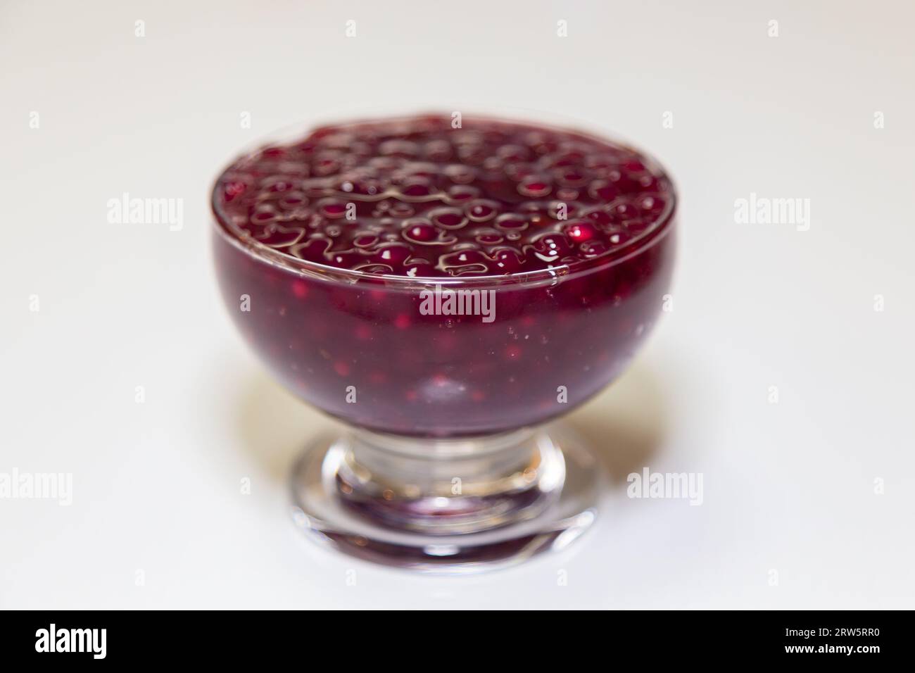 Red wine sago with vanilla cream, traditional cultural dessert from ...