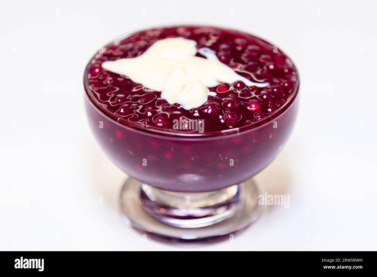 Red wine sago with vanilla cream, traditional cultural dessert from ...