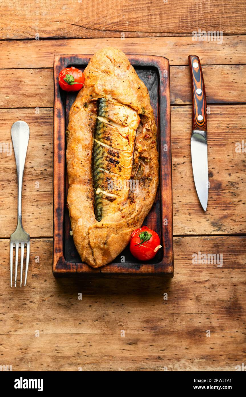 Homemade fish pie with mackerel on wooden table. Rustic style Stock ...