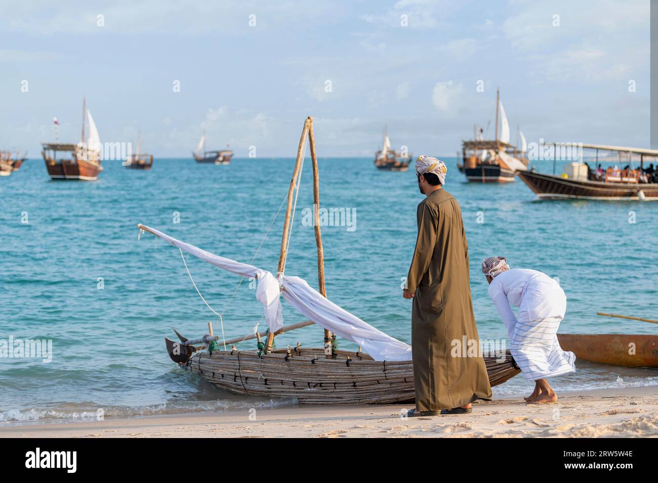 Dhow wooden boat maker. constructing dhow boat. Dhow Festival Doha ...