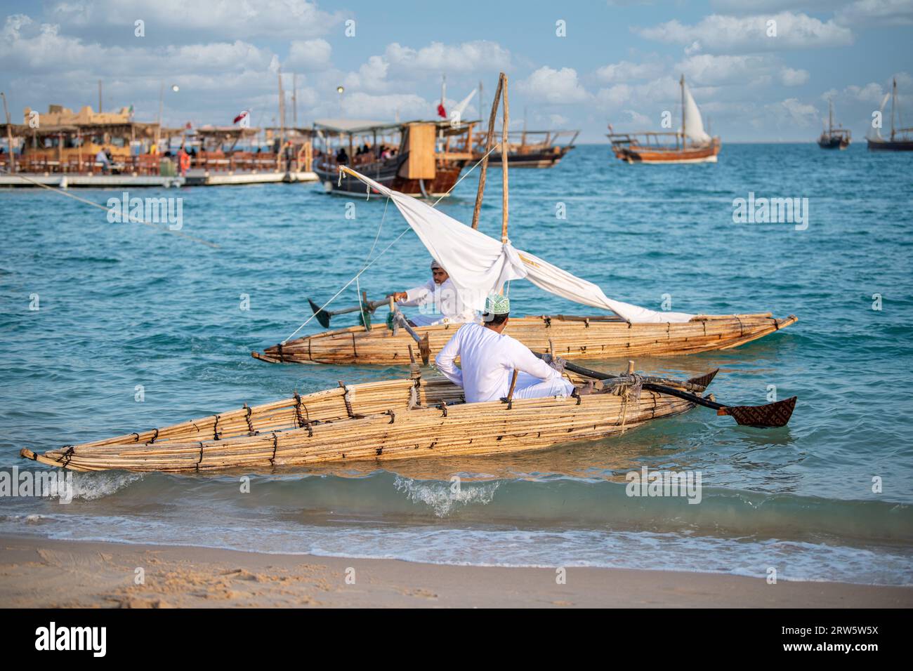Dhow wooden boat maker. constructing dhow boat. Dhow Festival Doha ...