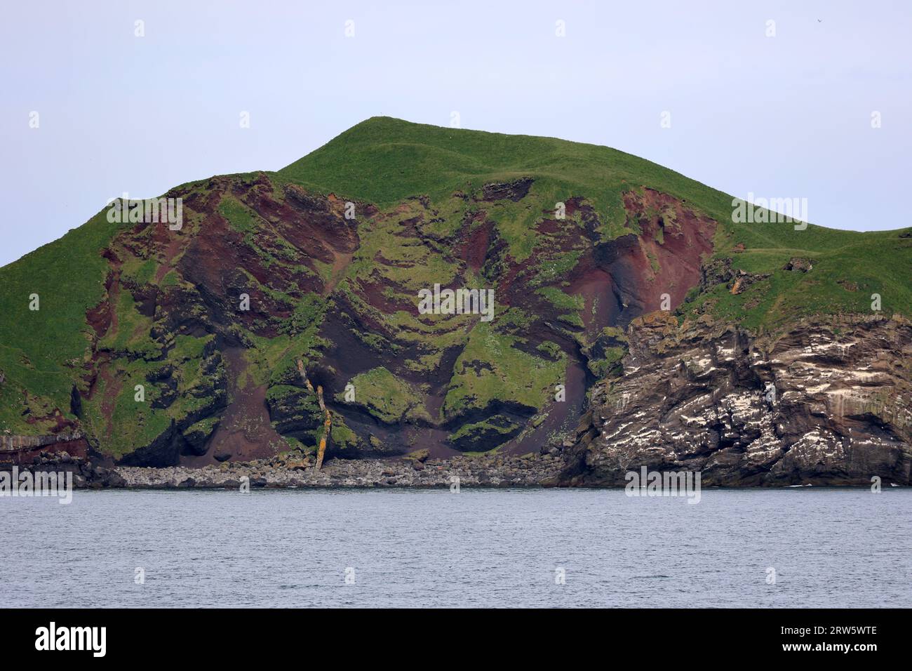 The Icelandic island of Ellidaey in the Vestmannaeyjar archipelago ...