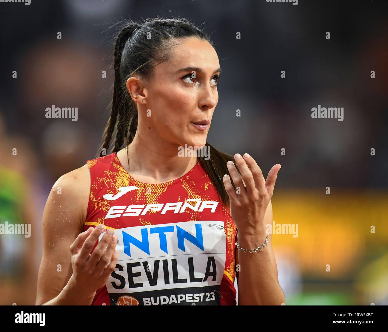 Paula Sevilla of Spain competing in the women’s 4x100m heats on day ...