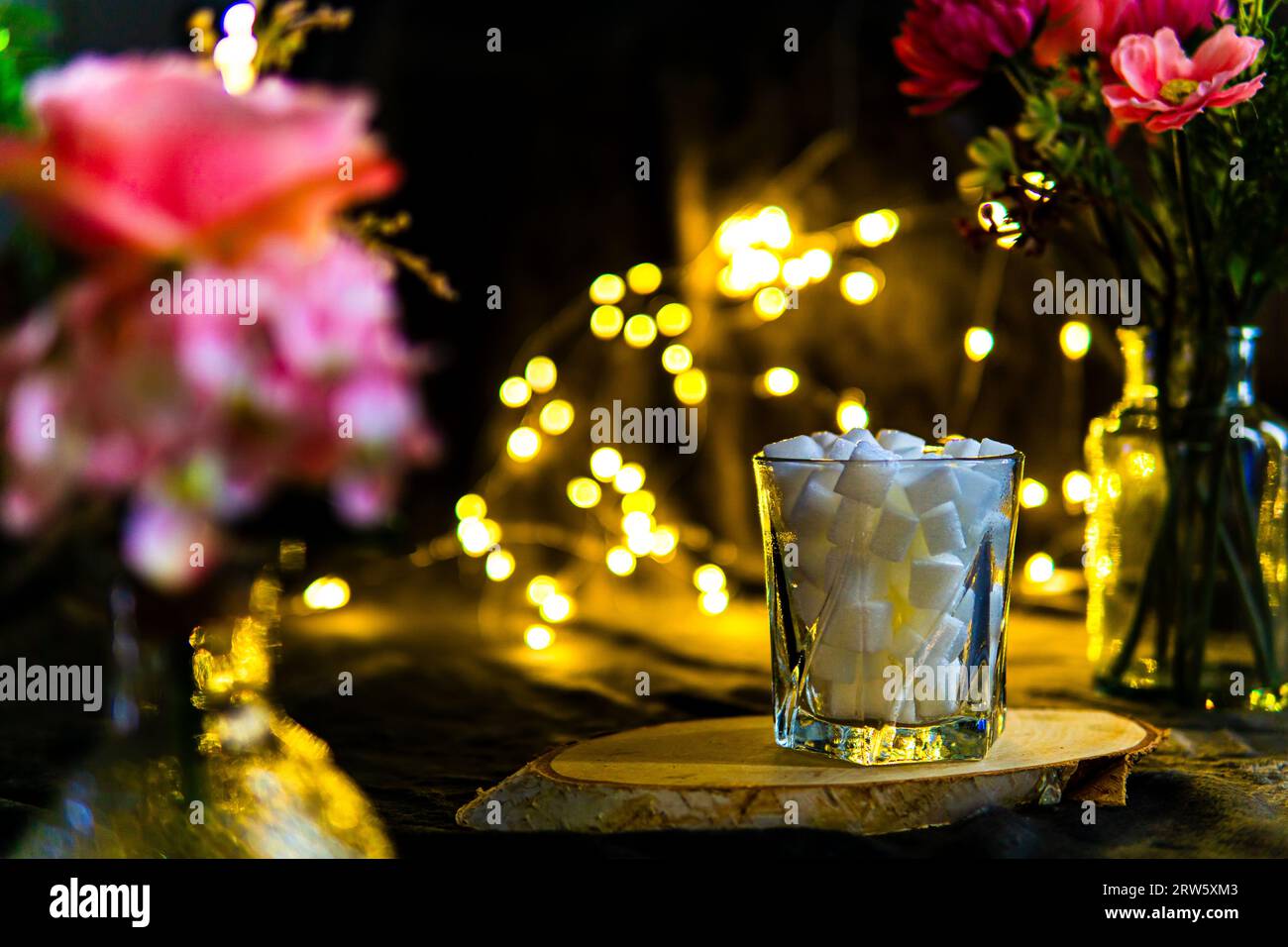 glass with sugar cubes, diabetes problem, unhealthy sugary food, sweet ...