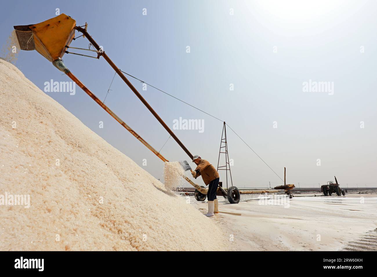 Spring salt production in a salt farm, North China Stock Photo - Alamy