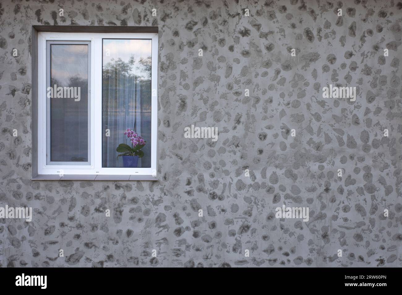 Window and gray facade of the house. Texture of fresh putty design ...