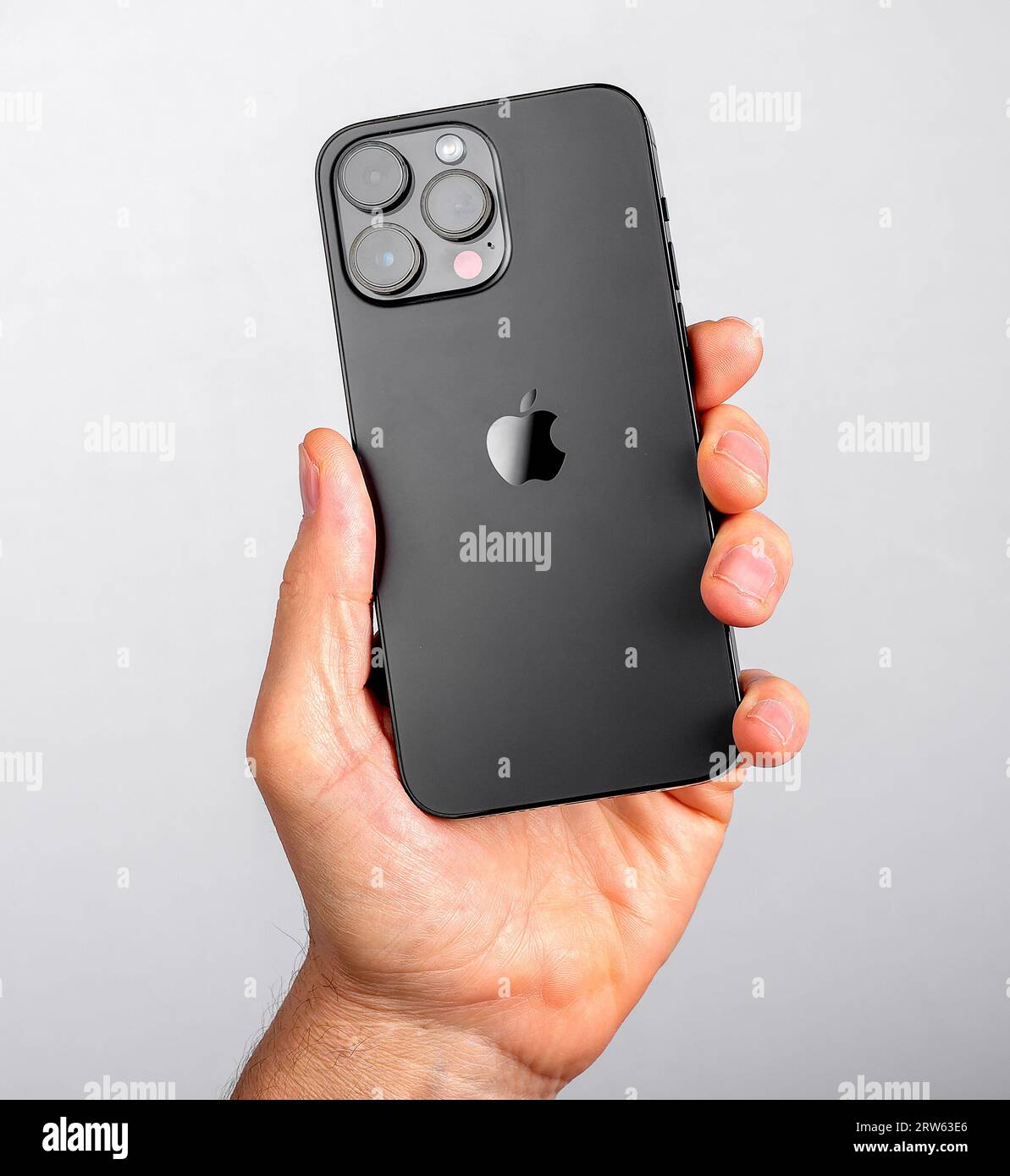 Berlin, Germany September 16 2023 Hand holding iphone 14 pro max back ...