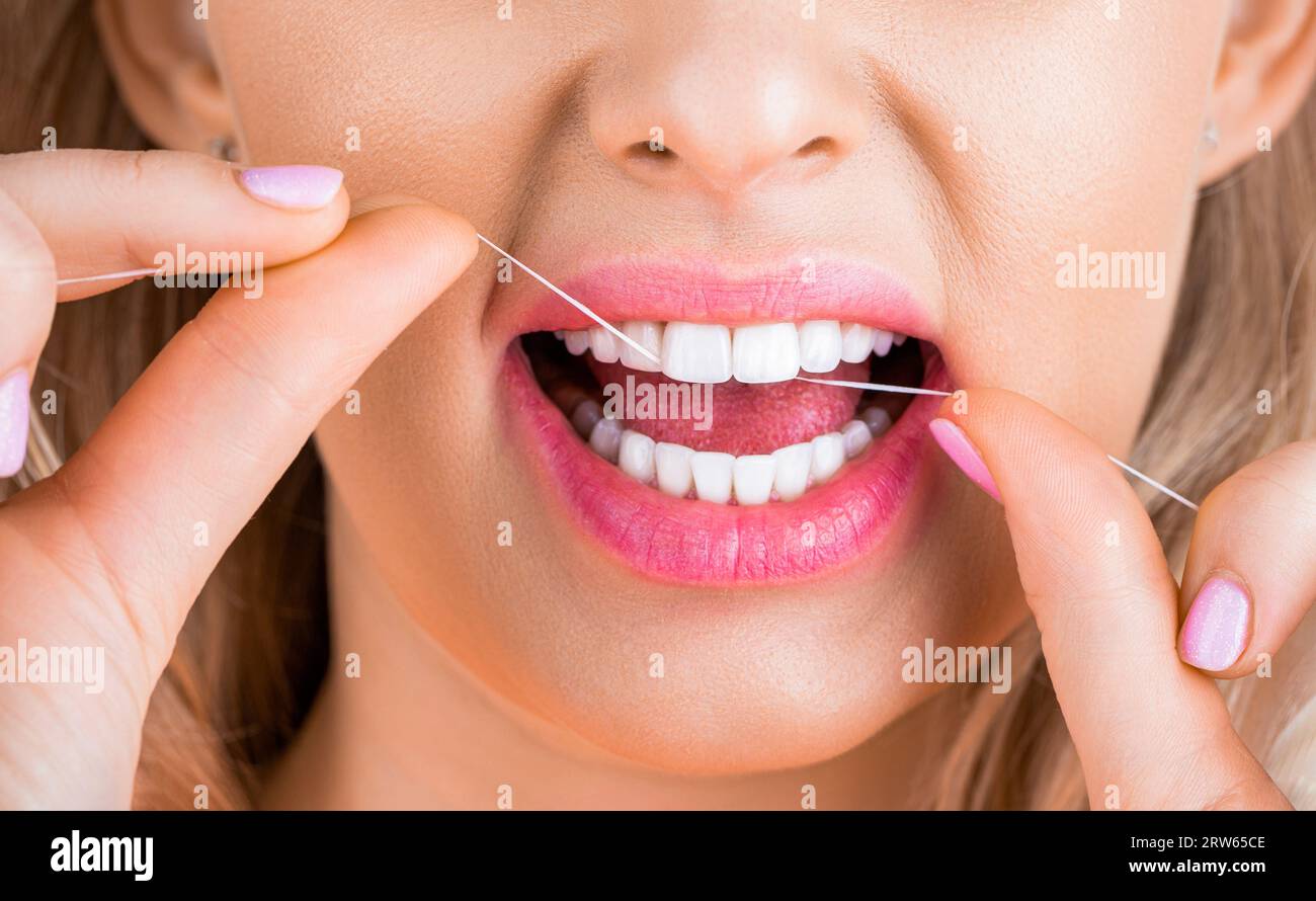 Healthy teeth concept. Teeths Flossing. Oral hygiene and health care ...