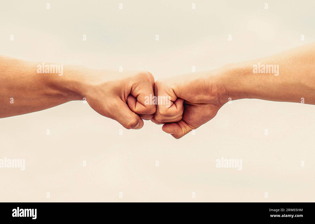 Fist clash greeting hi-res stock photography and images - Alamy