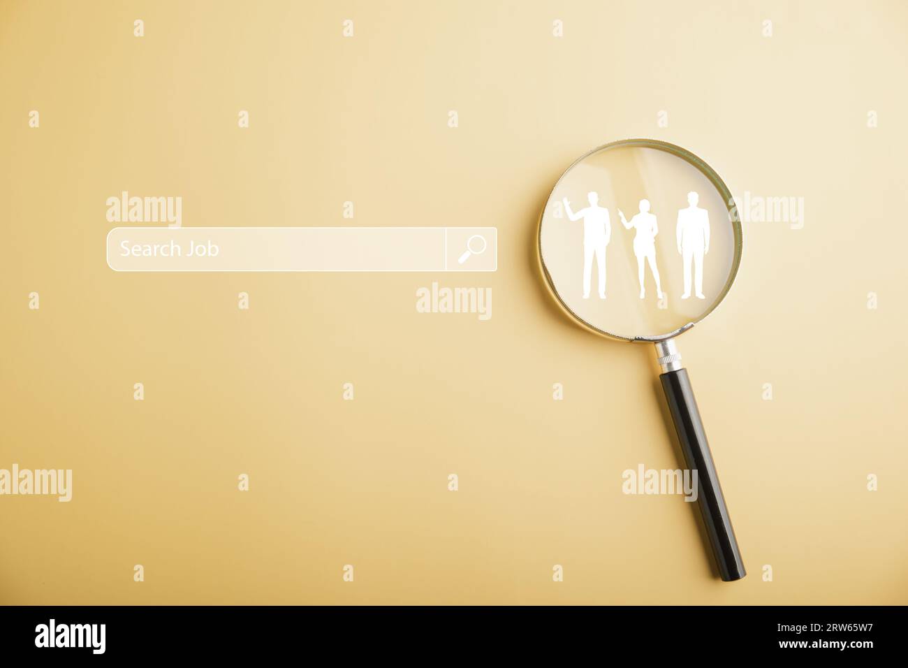 Focused magnifying glass on job search concept Stock Photo - Alamy