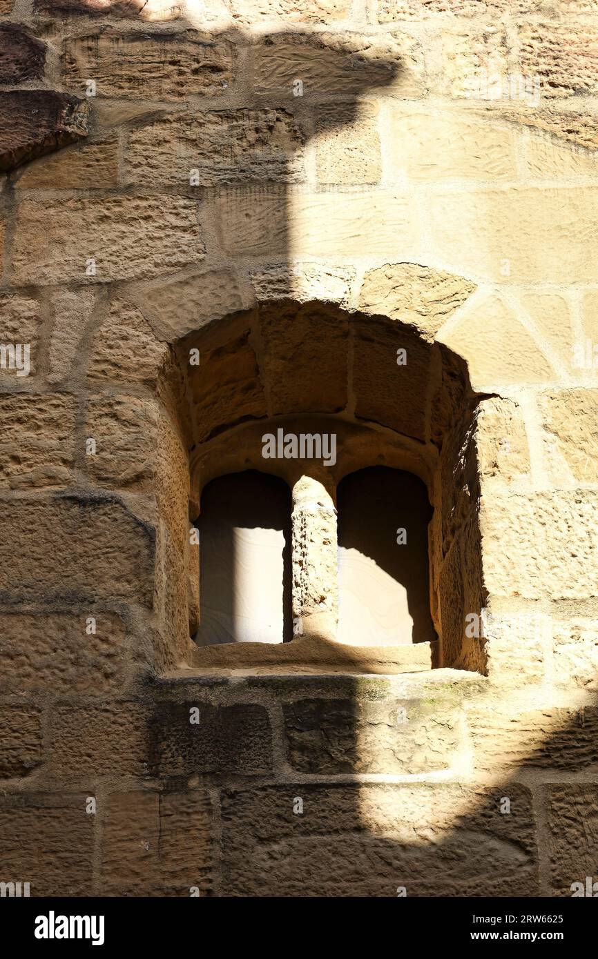 Eroded sandstone window with pillar of San Salvador church in Getaria ...