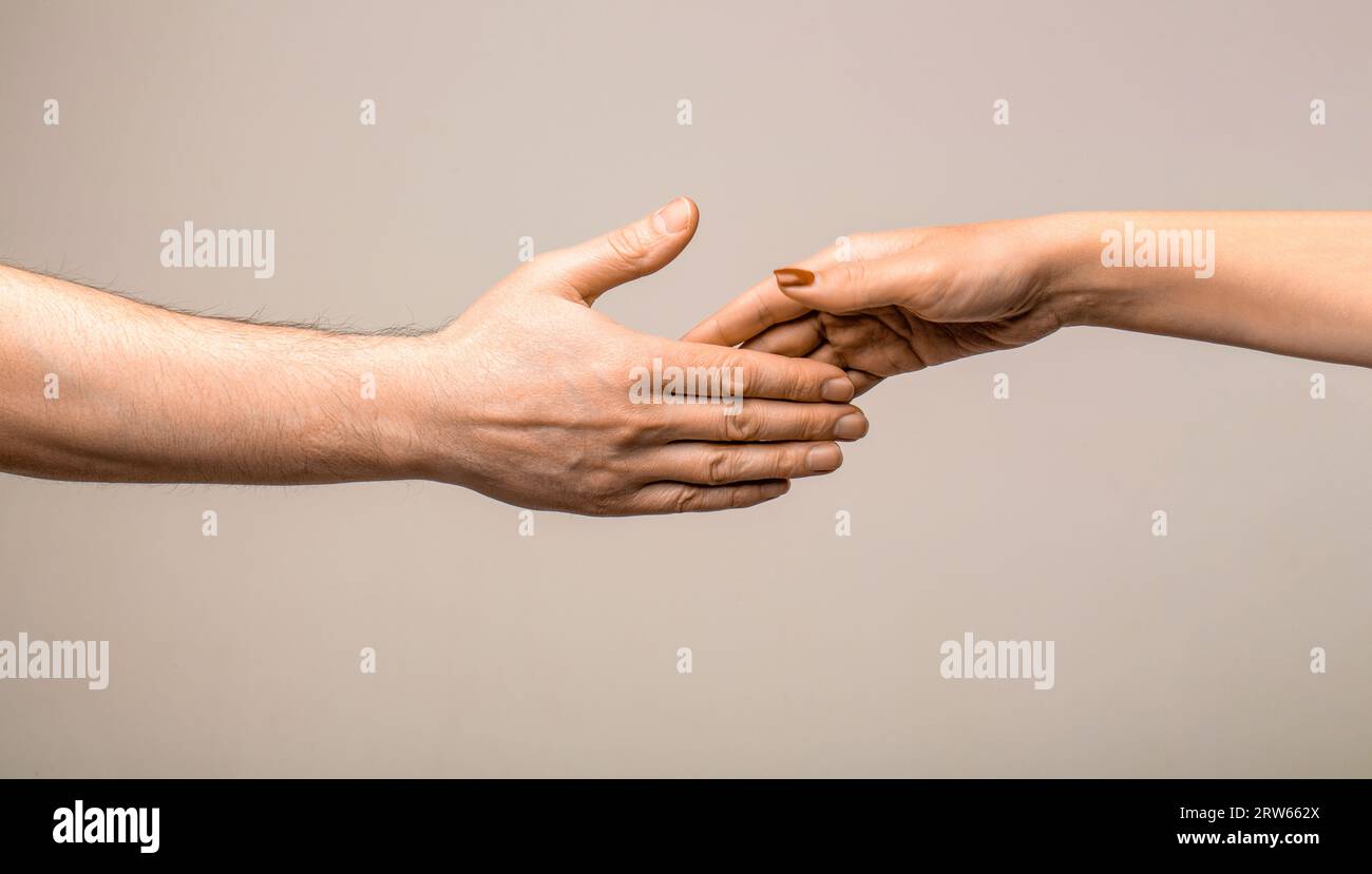Mercy, two hands, connection or help concept. Finger touching hands man ...