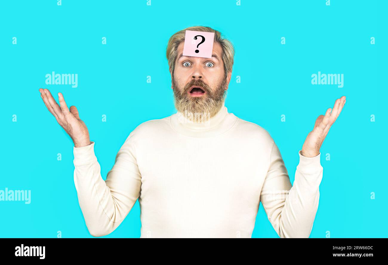 Thinking man with question mark on blue background. Man with question ...
