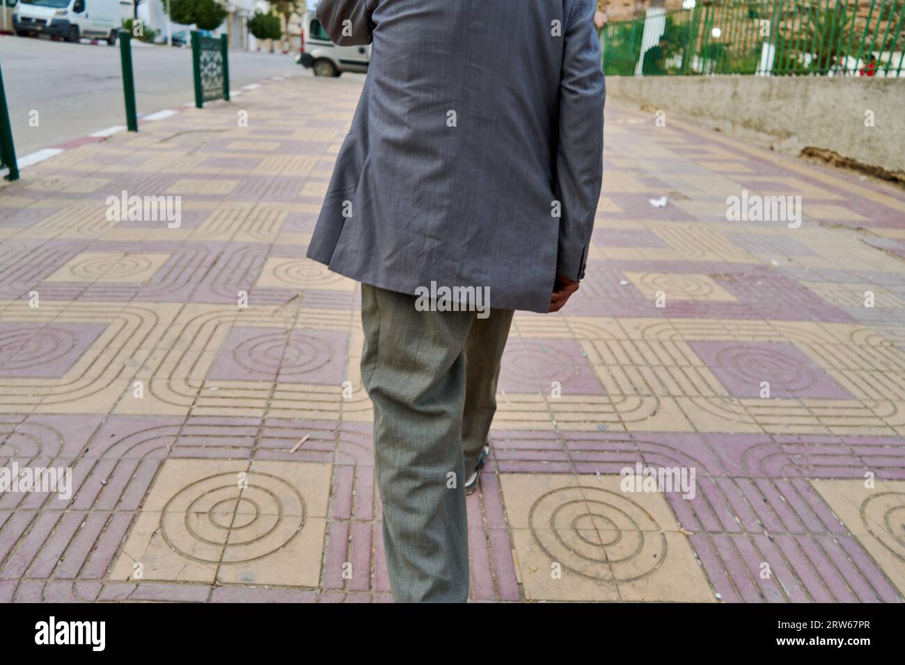 Person walking in the street hi-res stock photography and images - Alamy