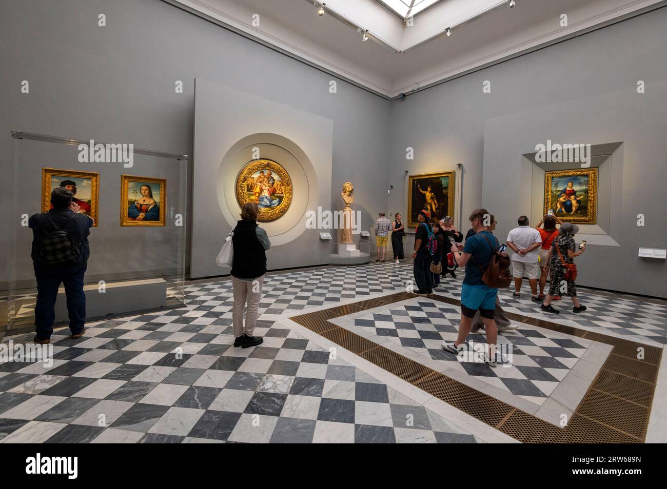 A circular painting of the Holy Family with Young St. John the Baptist ...