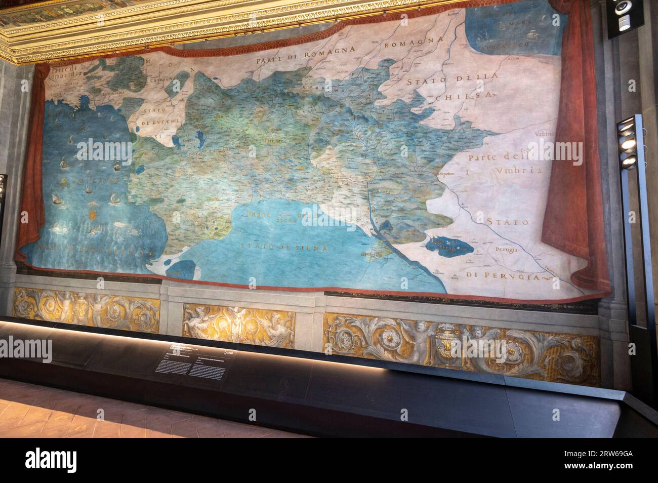 A large oil mural wall map plastered on the wall of the new Dominion of ...