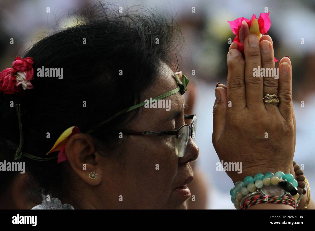 Sleman, Yogyakarta, Indonesia. 17th Sep, 2023. A Hindu devotee attends ...