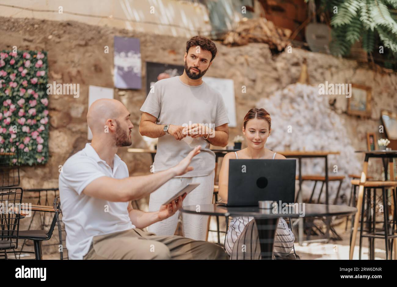 Successful Business Team Discussing Strategies at Outdoor Meeting Area ...