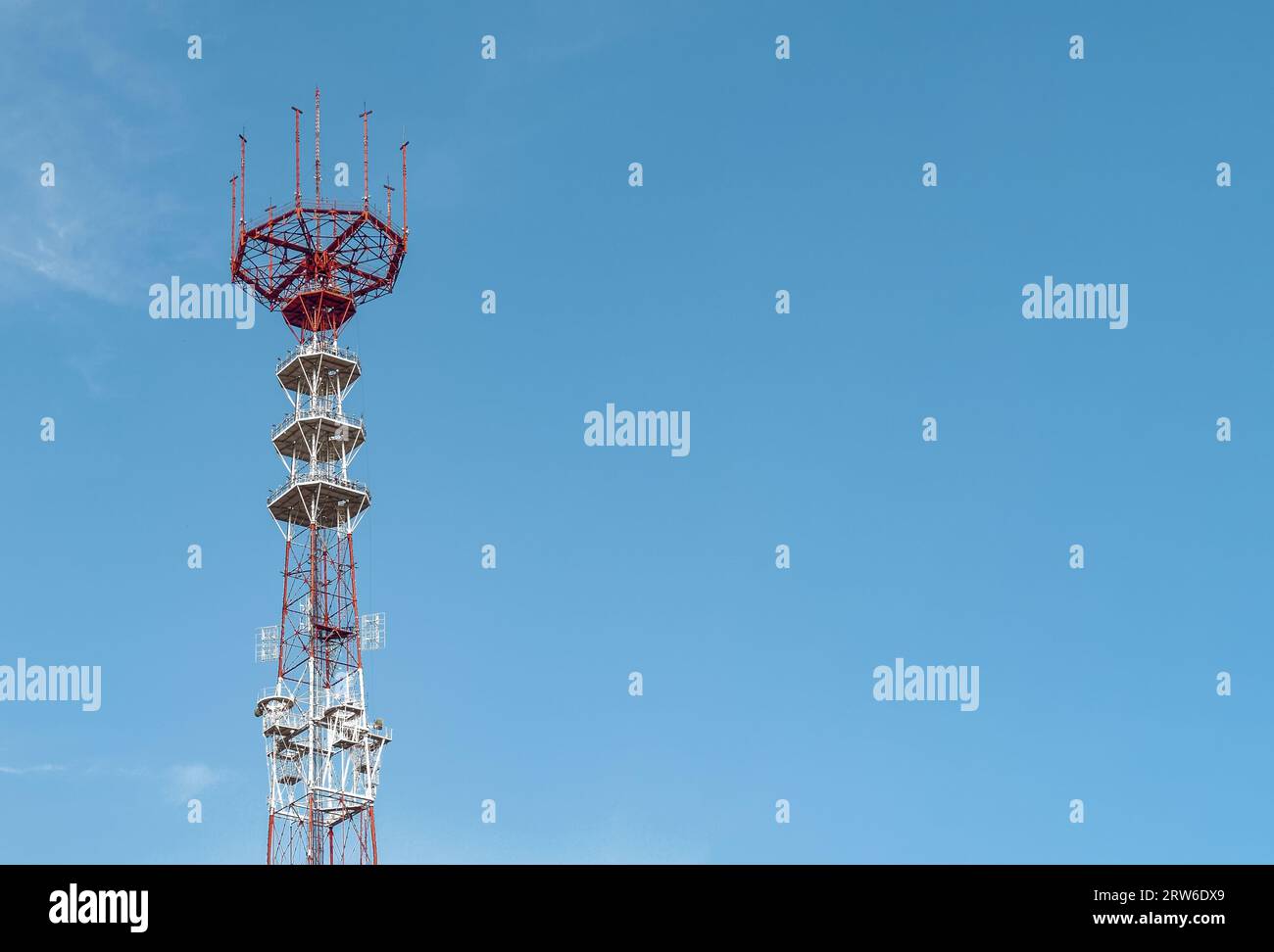 Telecommunication TV broadcast tower, sky background Stock Photo - Alamy