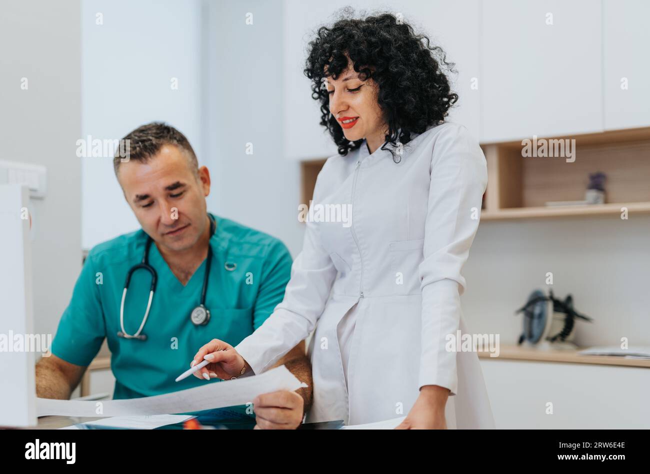 A doctor provides expert advice and diagnostics in a healthcare clinic ... A doctor provides expert advice and diagnostics in a healthcare clinic ...
