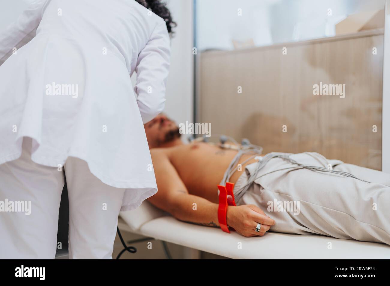 A professional cardiologist analyzing cardiogram test results and ...