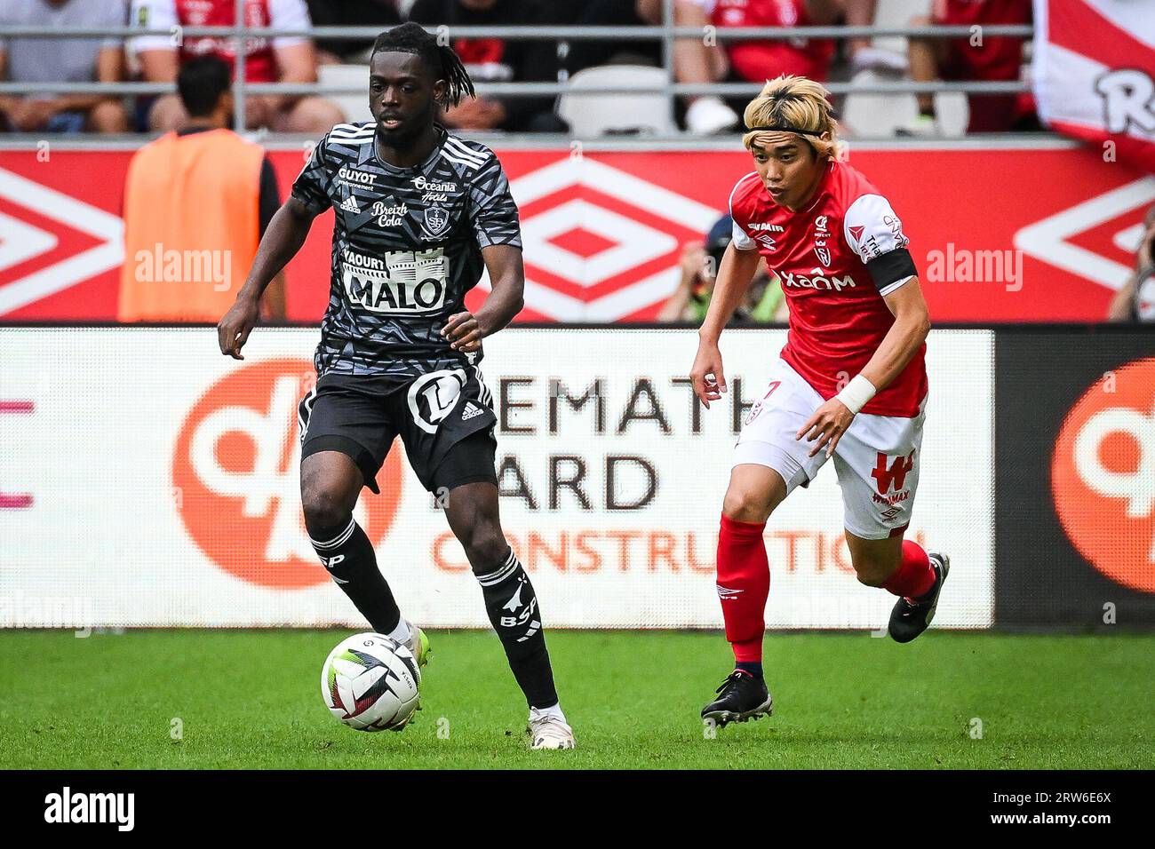 Reims, France. 17th Sep, 2023. Bradley LOCKO of Brest and Junya ITO of ...