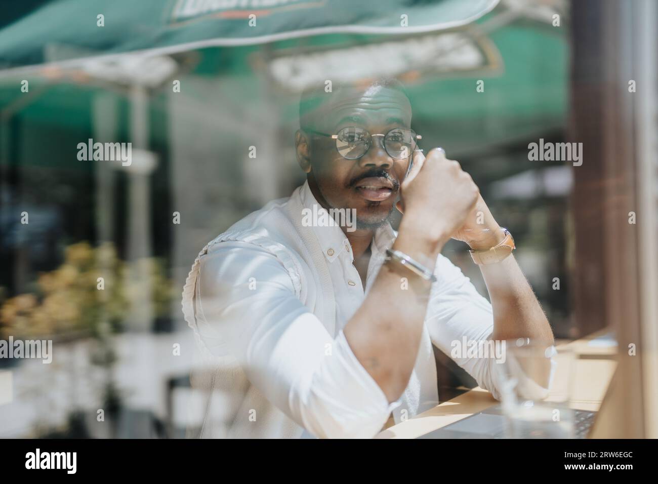 Businessman discussing new project ideas for bigger profit during phone ...