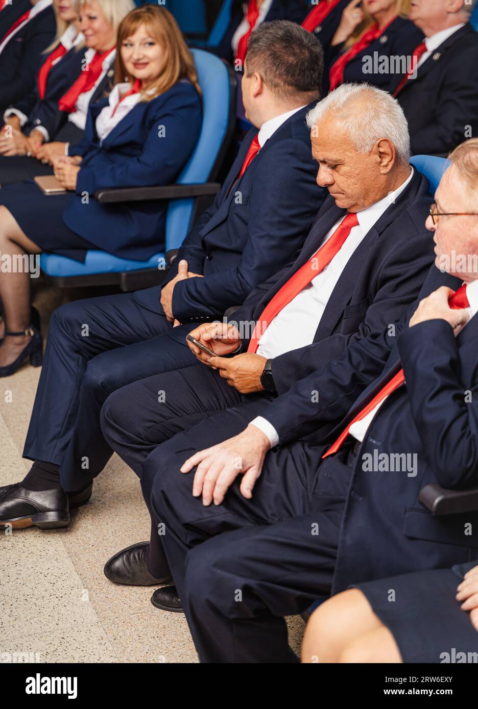 Business people attending seminar or training at modern conference hall ...