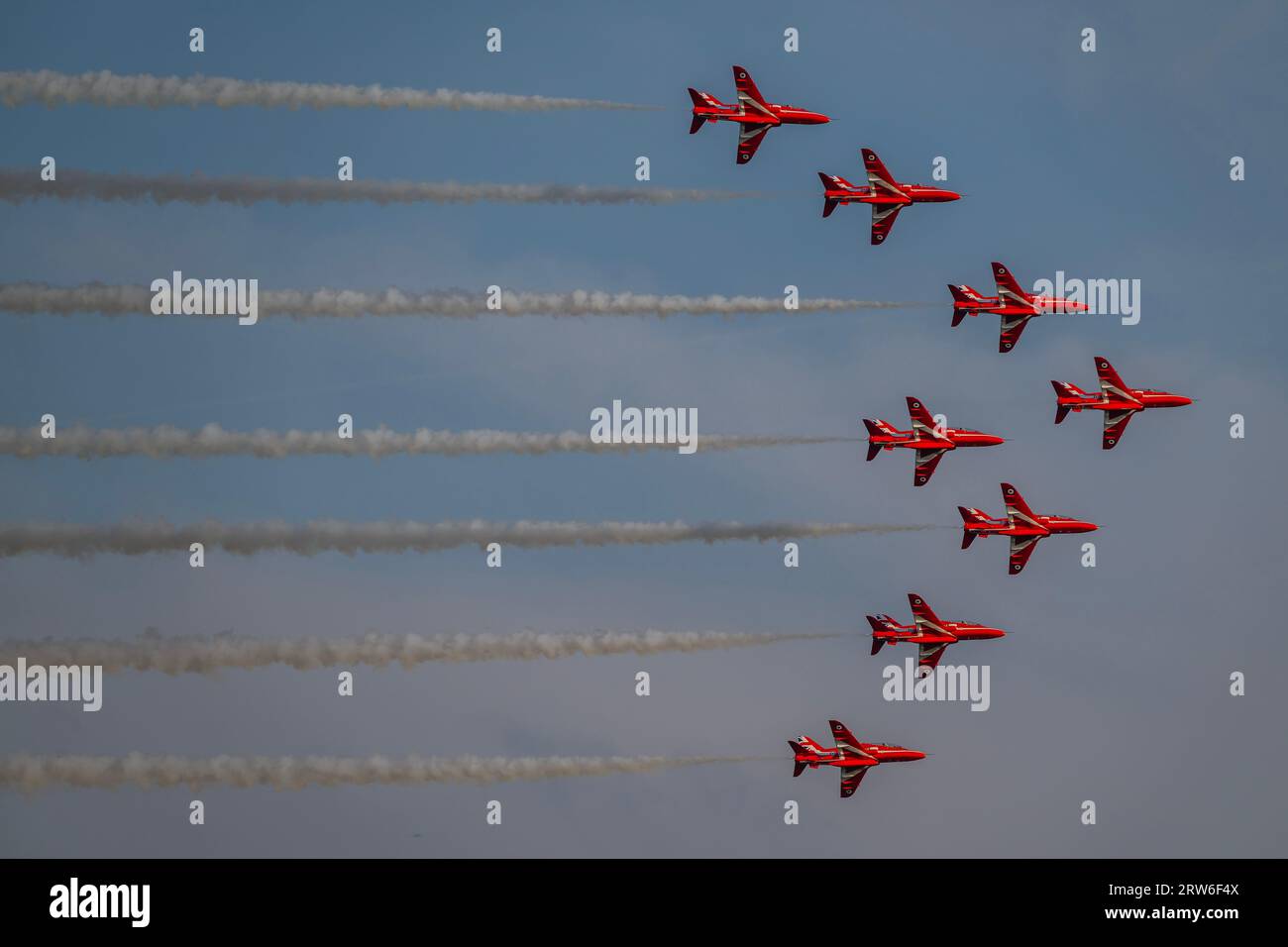The Red Arrows perform a delayed aerobatic display - The Duxford Battle ...