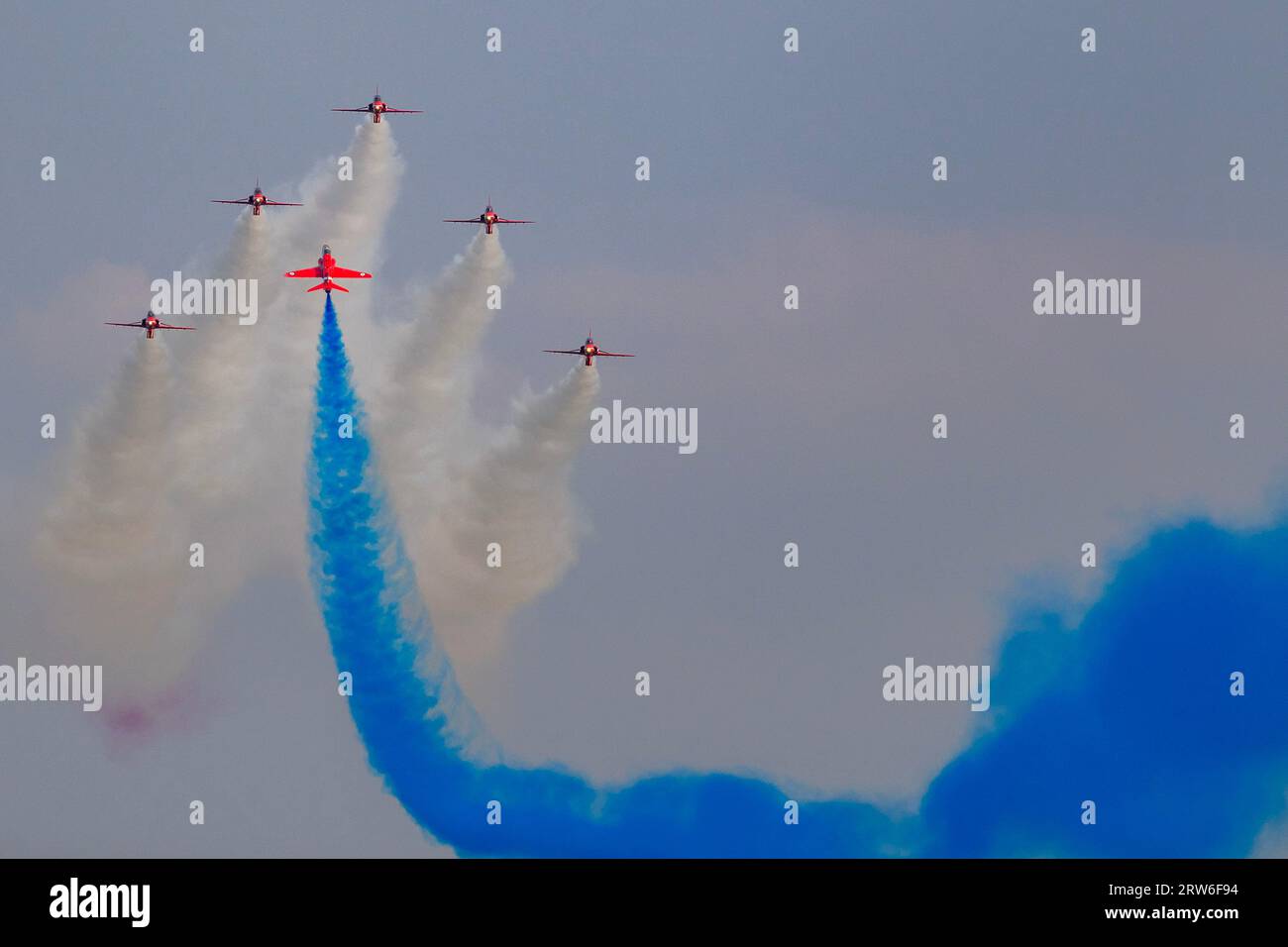 The Red Arrows perform a delayed aerobatic display - The Duxford Battle ...