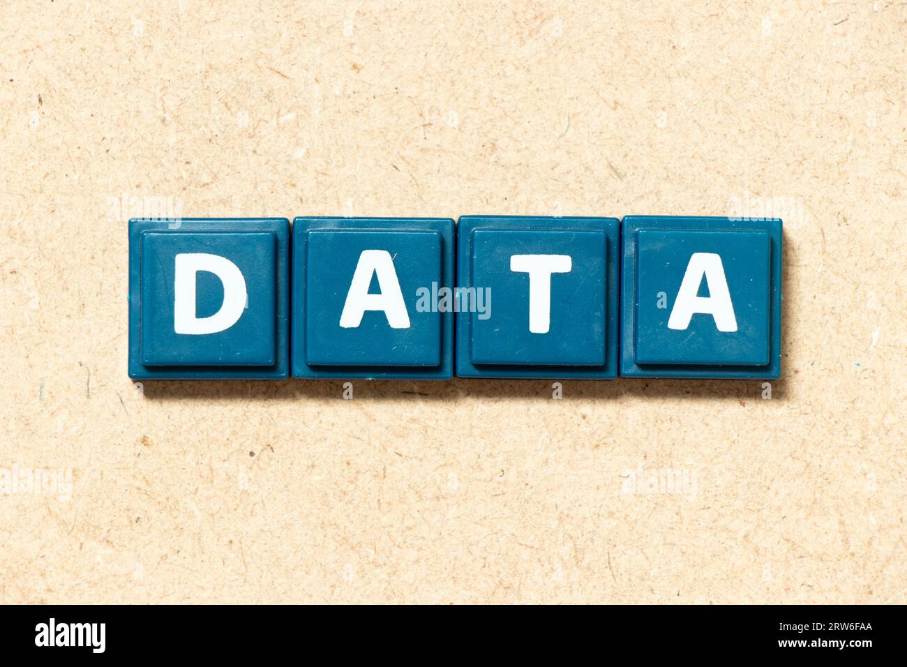 Tile alphabet letter in word data on wood background Stock Photo - Alamy