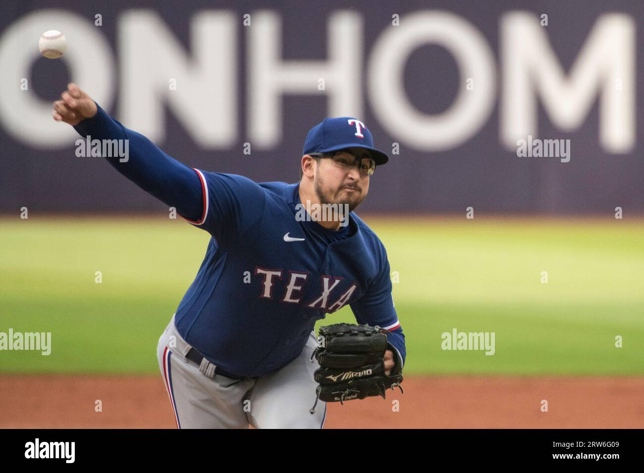 Texas Rangers starting pitcher Dane Dunning delivers during the first ...