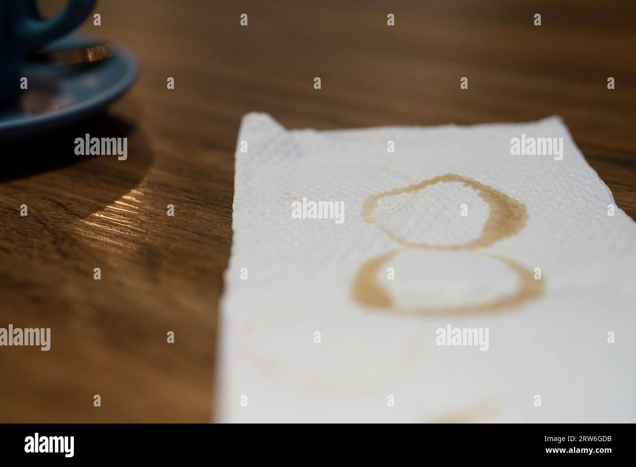 Napkin with a coffee stain Stock Photo - Alamy