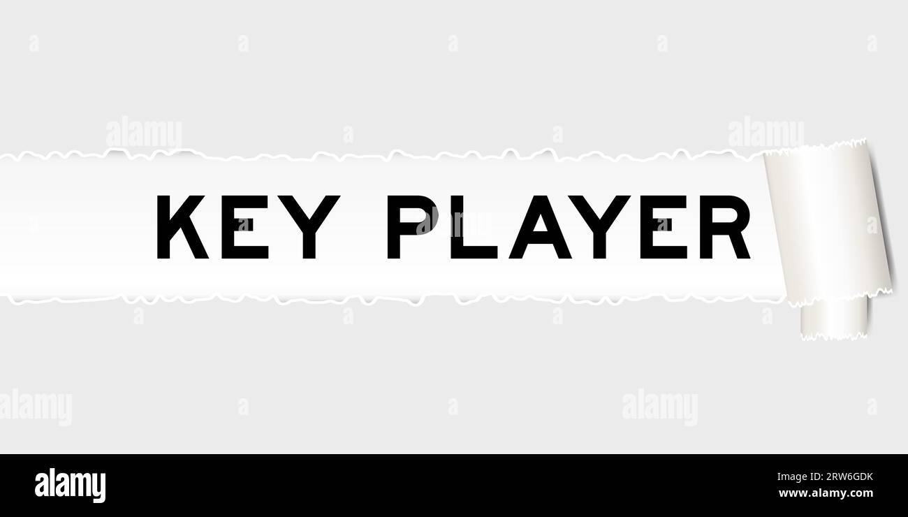 Ripped gray paper background that have word key player under torn part ...