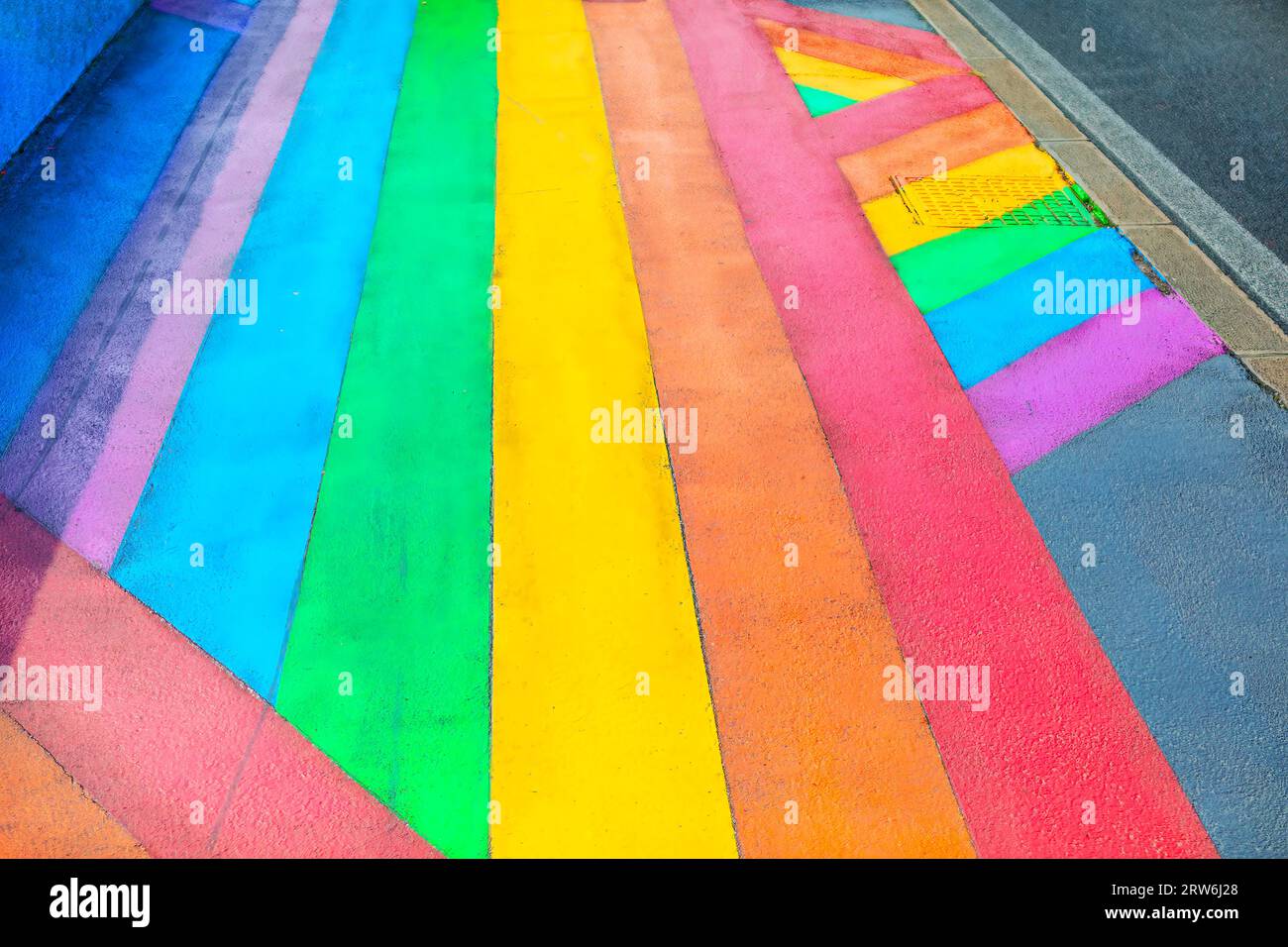 Colorful street crossing on the floor of a street Stock Photo - Alamy