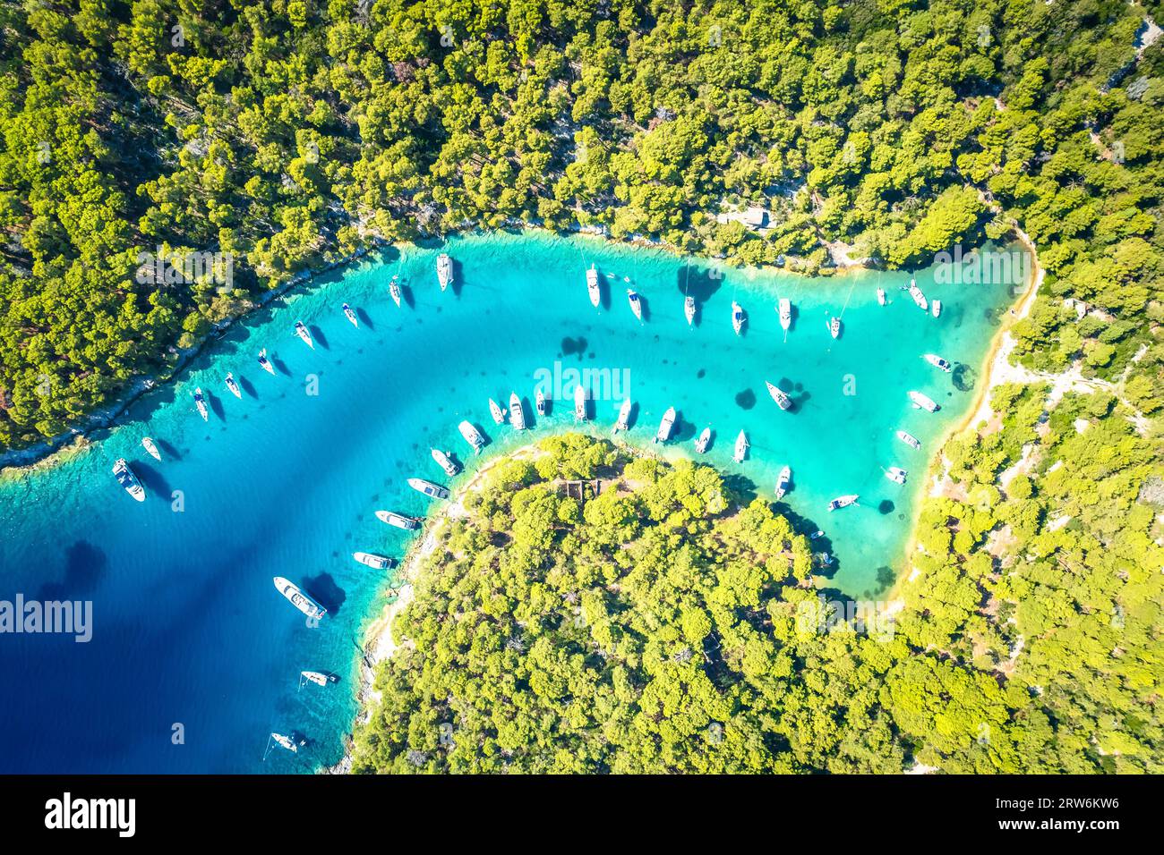 Turquoise sailing safe bay on Mali Losinj island aerial view ...