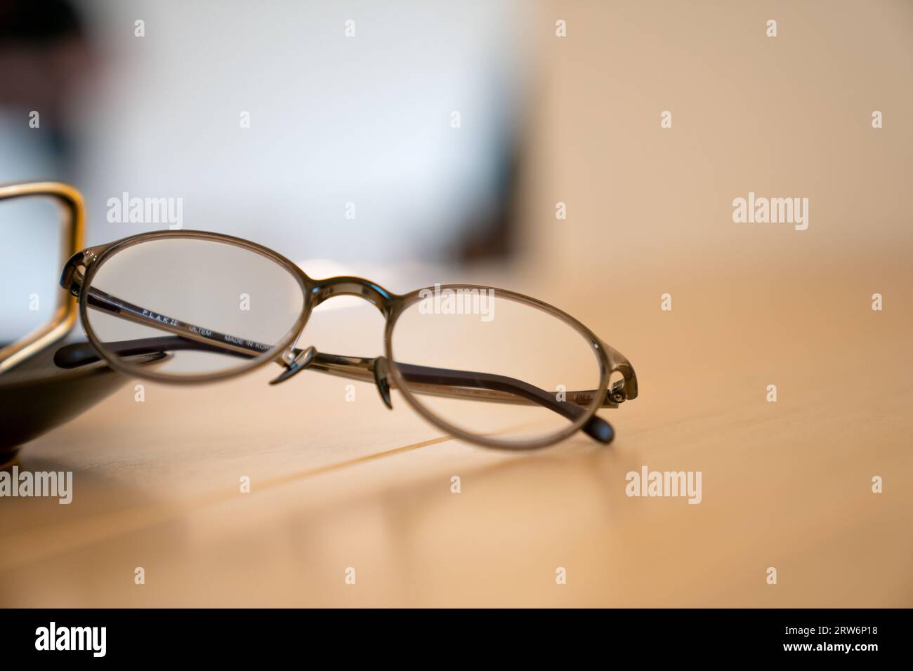 Stylish eyeglasses over pastel background. Optical store, glasses ...