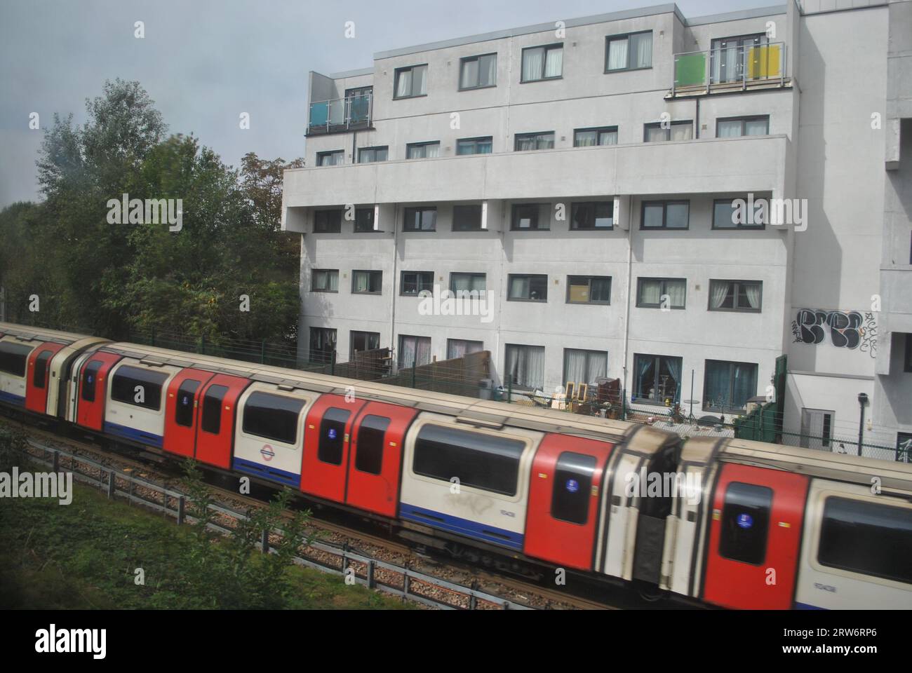 An eastbound central line train passes between E Acton and White City ...