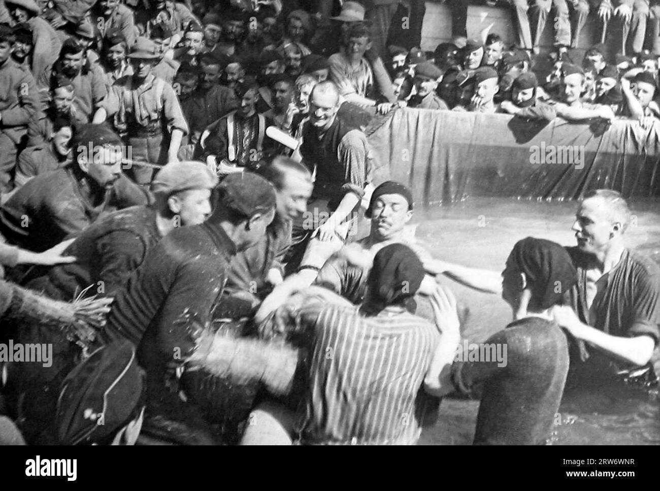 Troop ship 'crossing the line' ceremony, early 1900s Stock Photo - Alamy