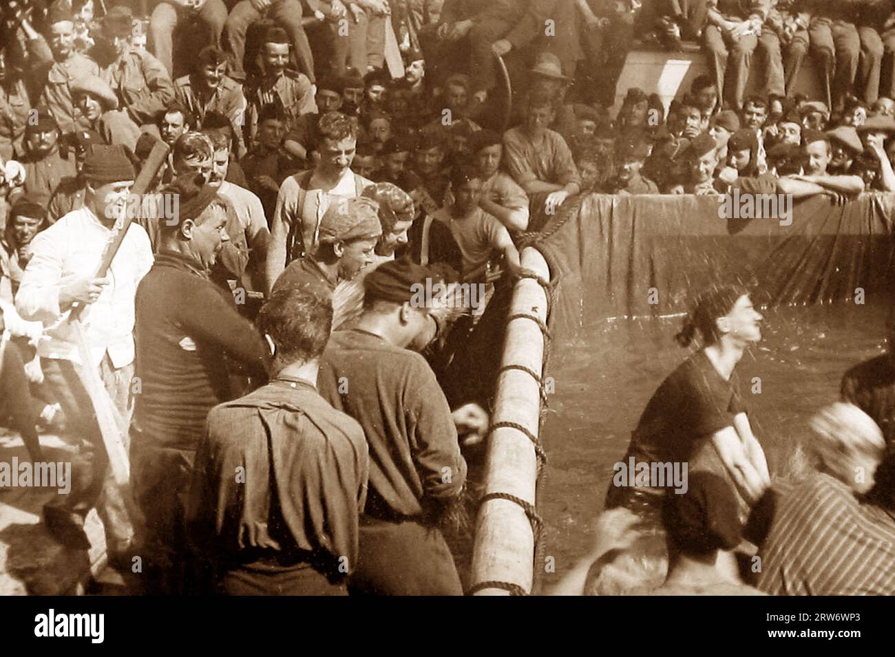 Troop ship 'crossing the line' ceremony, early 1900s Stock Photo - Alamy